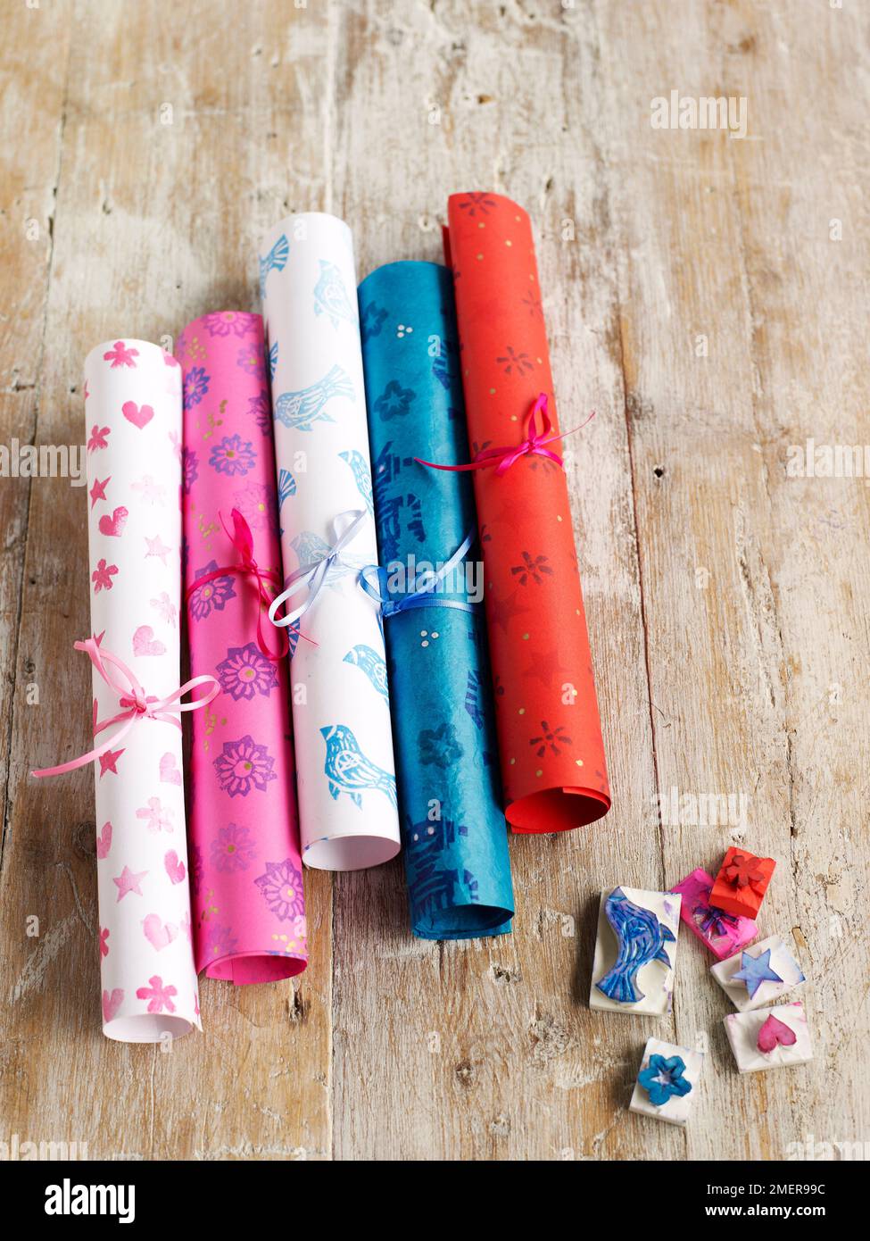 Rolls of handmade patterned wrapping paper, stamps Stock Photo - Alamy