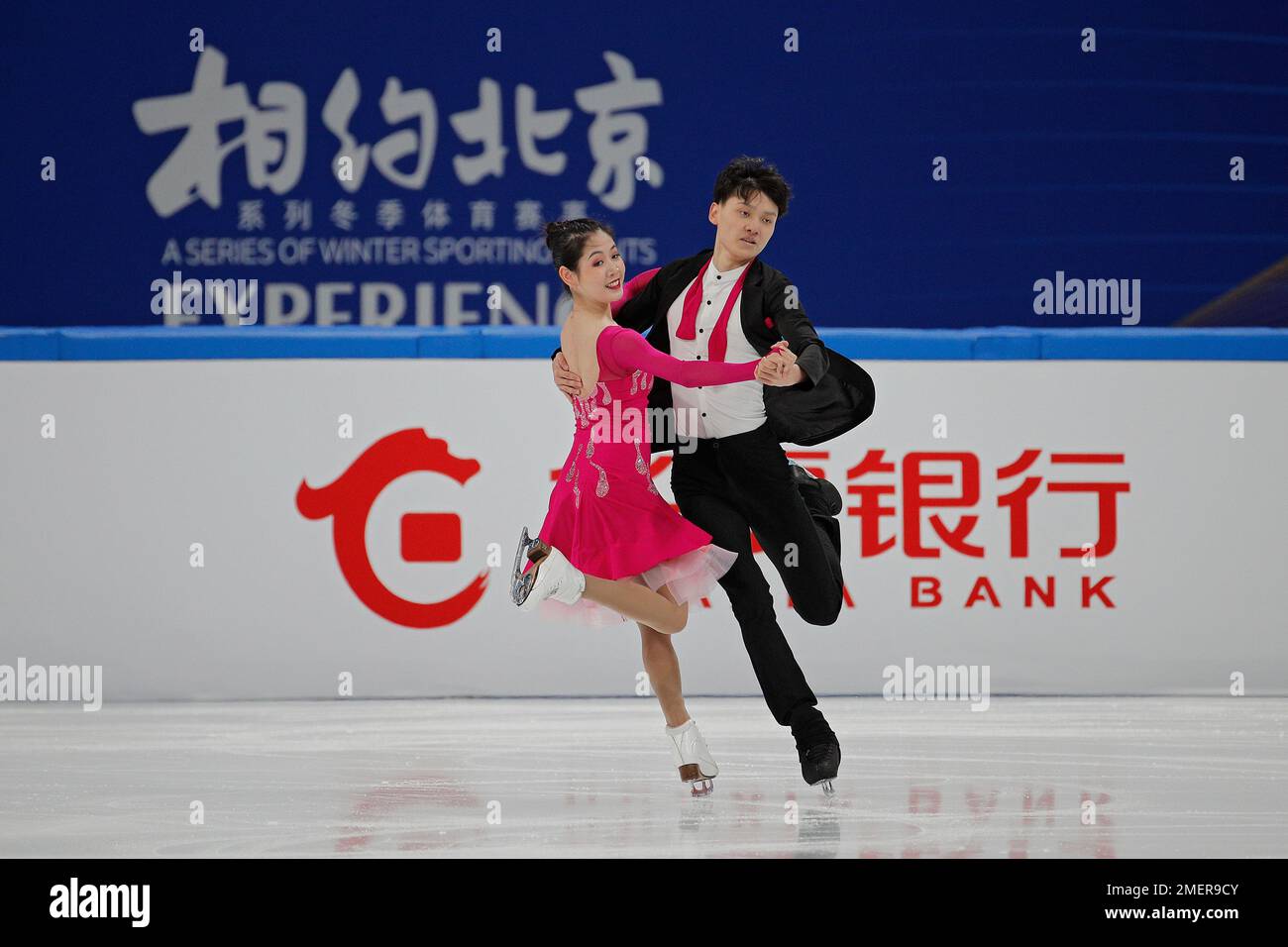 Chinese skaters Yang Yixi and Deng Shun Yuyao perform their pairs short ...