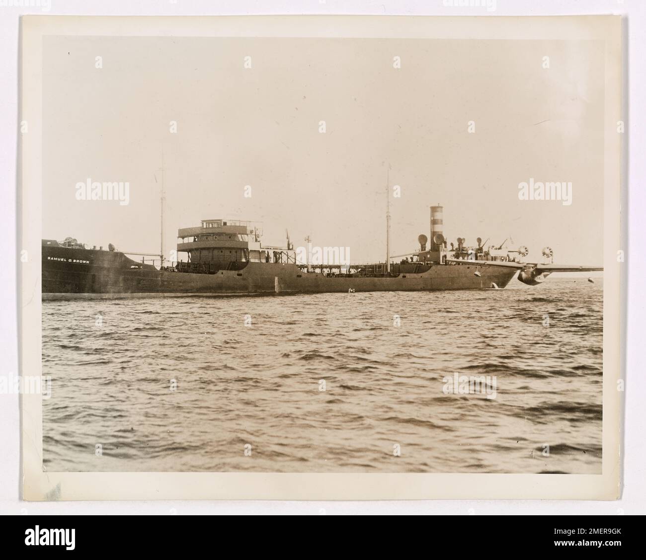 A Coast Guard plane lands to evacuate a critically burned man for ...