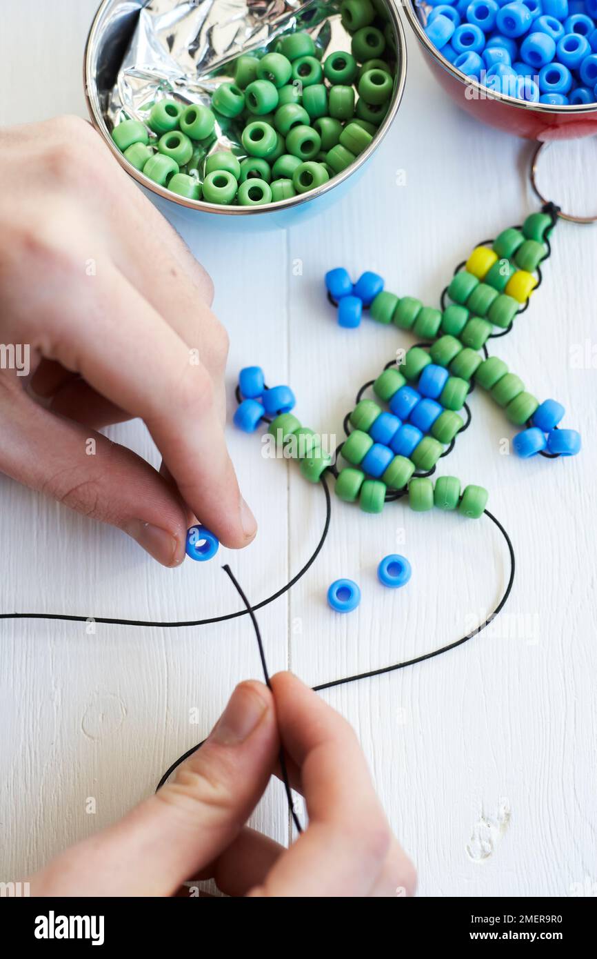 Making beaded lizard key ring Stock Photo - Alamy