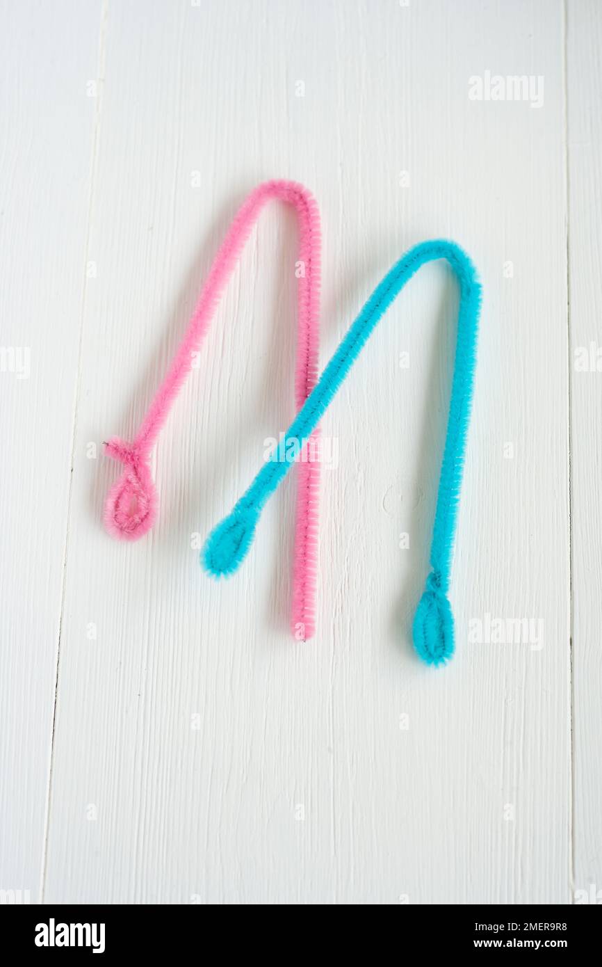 Pink and blue pipe cleaner Stock Photo - Alamy