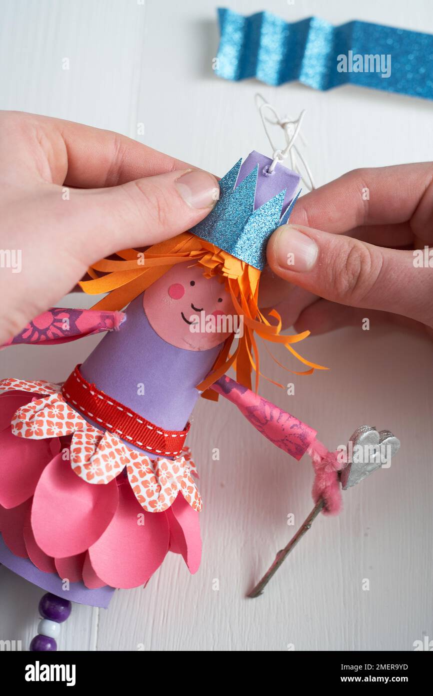 Making paper fairy decoration Stock Photo - Alamy