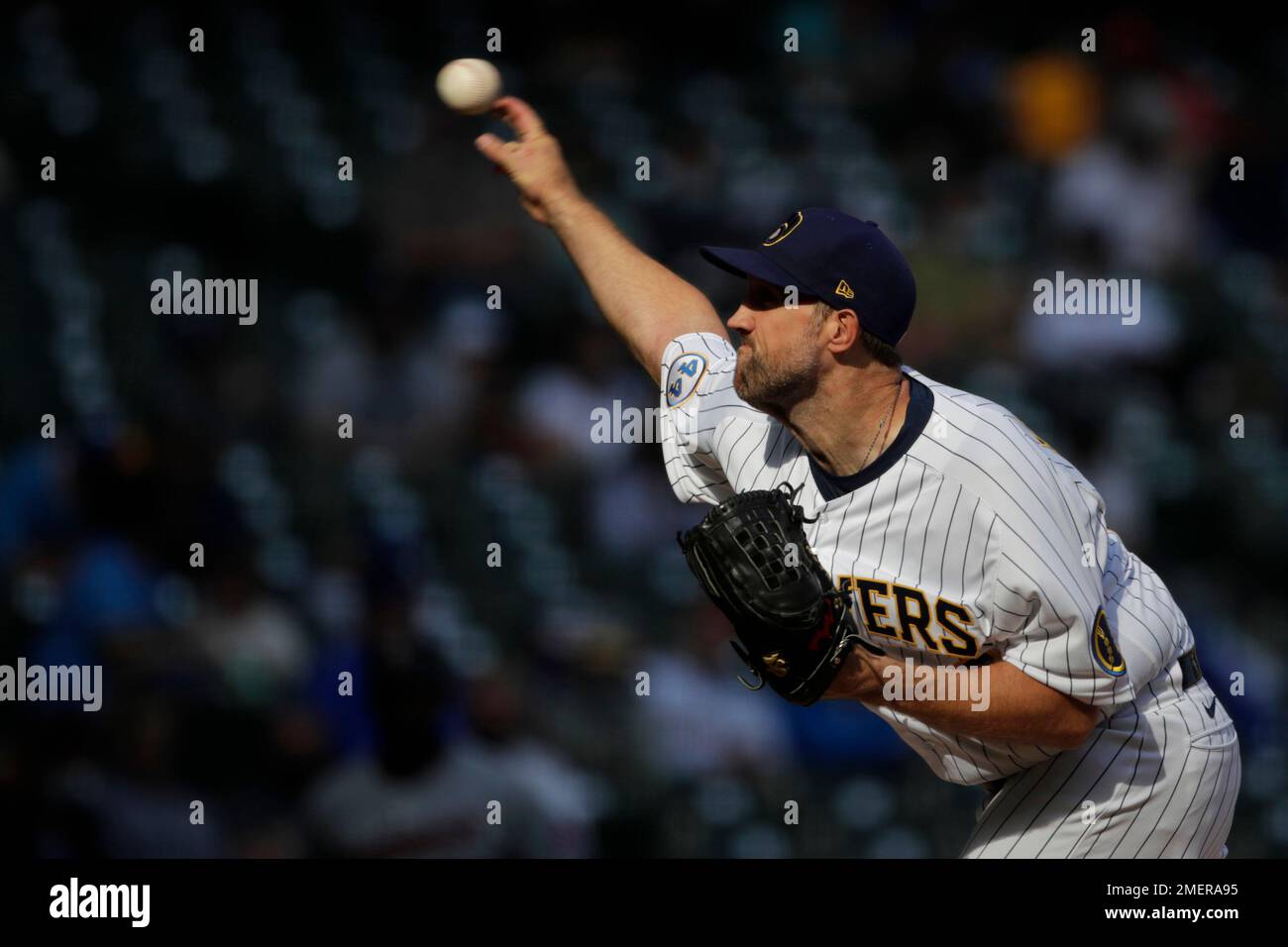 Milwaukee Brewers' Josh Lindblom pitches during the eighth inning of a ...