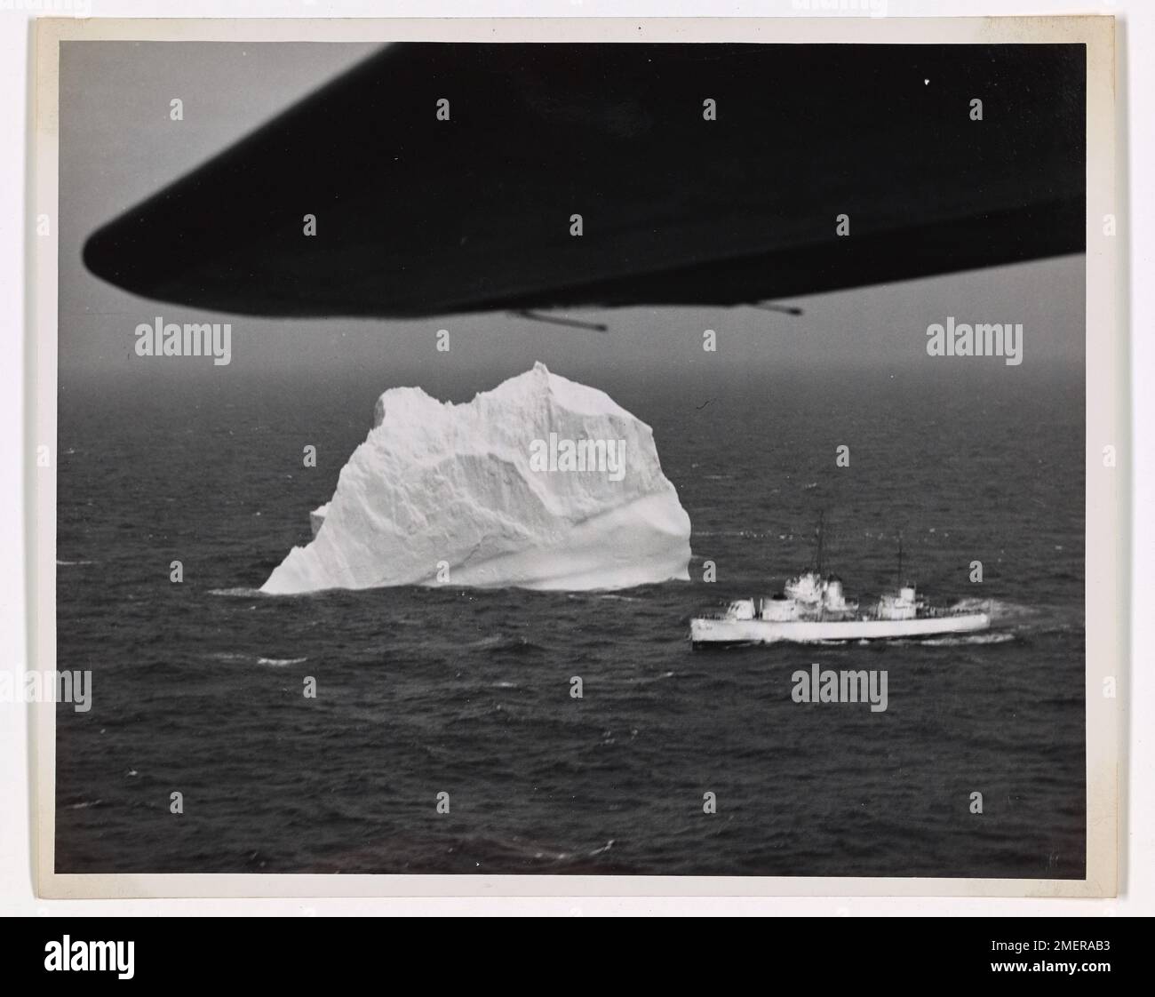 A Coast Guard-converted B-17 aircraft conducts an ice patrol mission ...