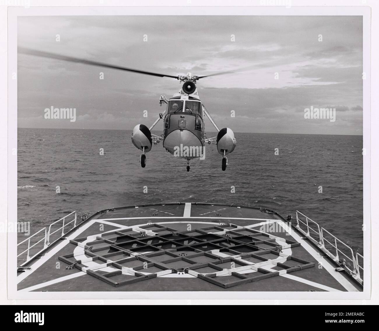 Photograph of HH-52A Helicopter Returning to USCGC Diligence After ...