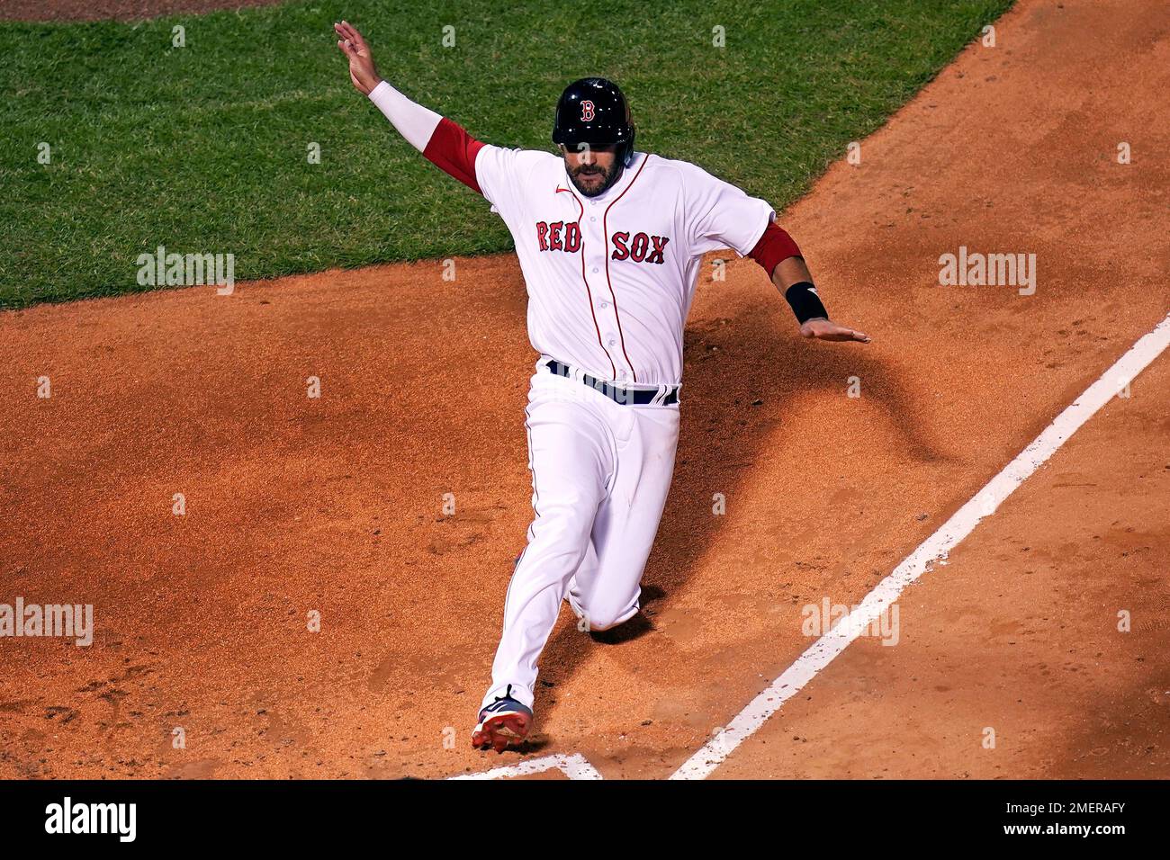 Boston Red Sox's J.D. Martinez scores on a double by Xander Bogaerts ...