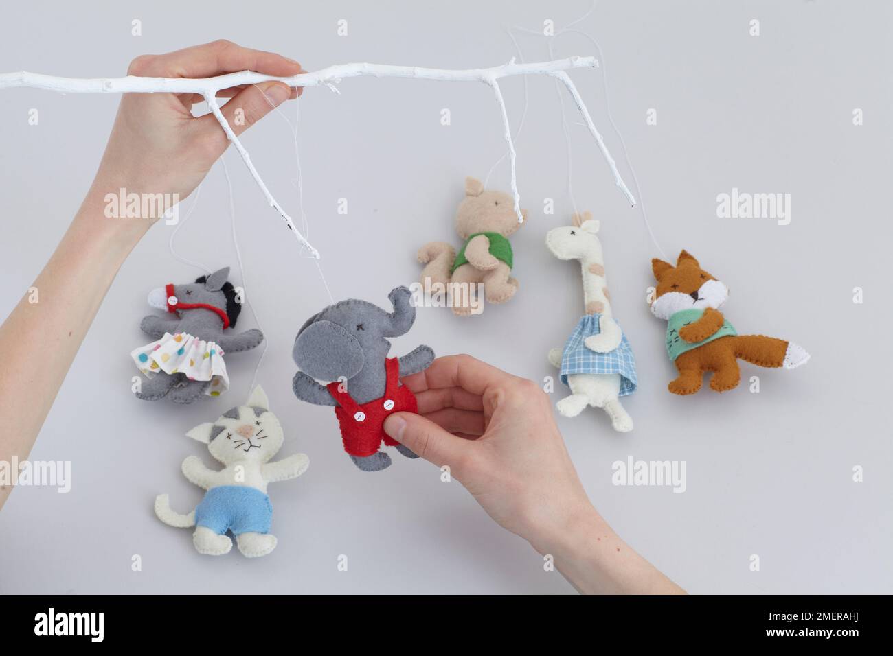 Felt animal mobiles Stock Photo - Alamy