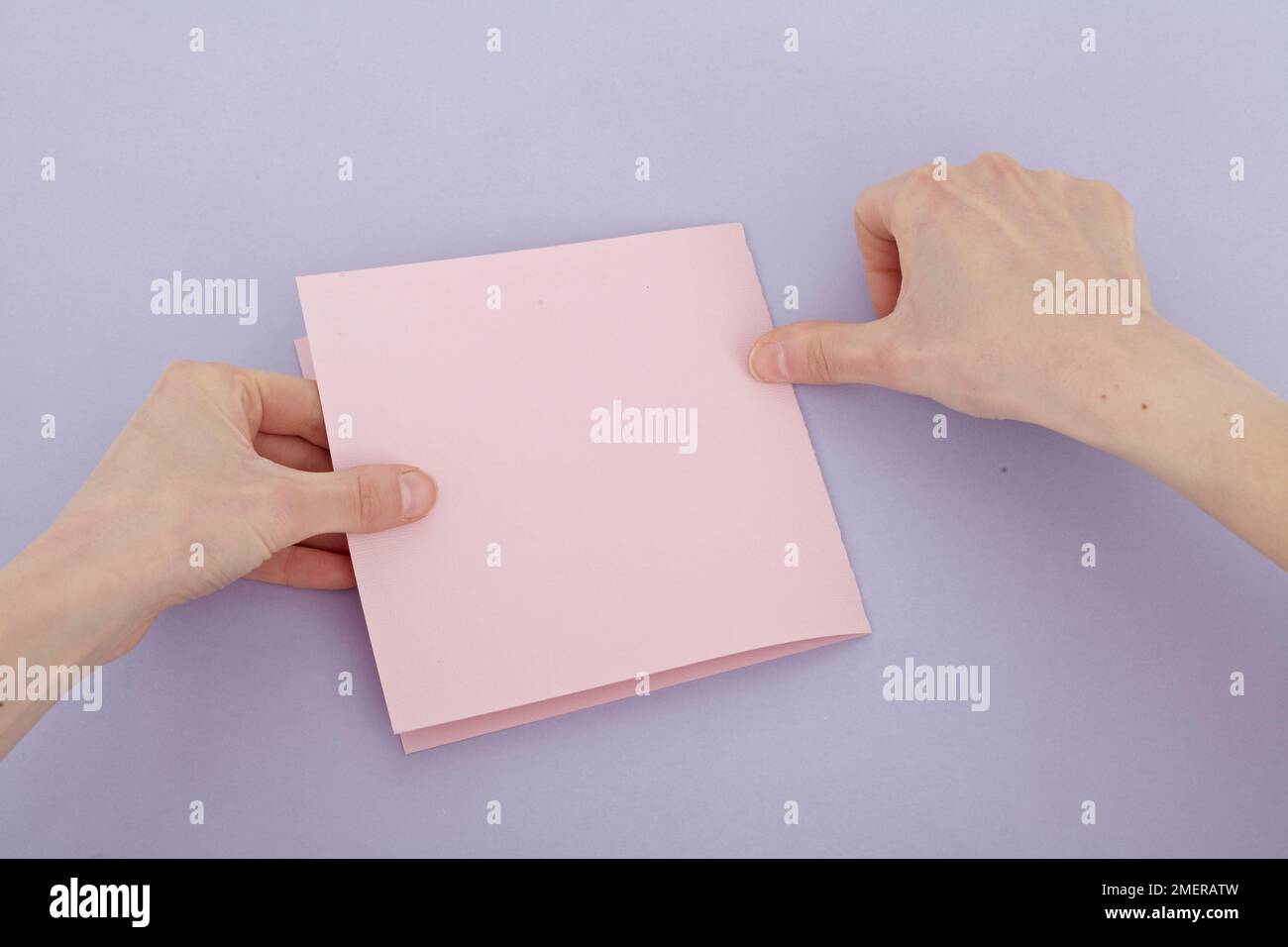 Folding hands hi-res stock photography and images - Alamy