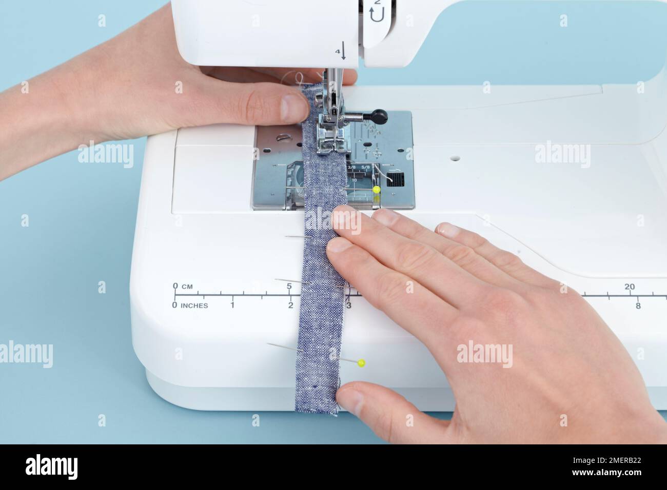 Sew the length of the tail, making a soft mouse toy Stock Photo - Alamy