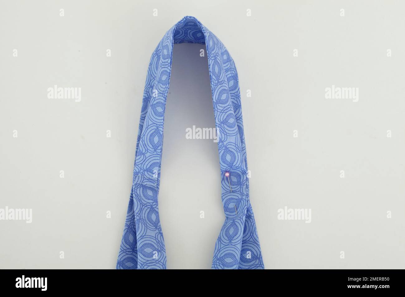 Making strap for nappy bag Stock Photo - Alamy
