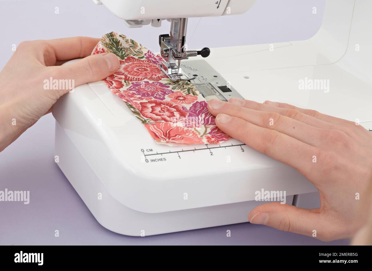 Making a toy octopus, sew around the outer edge of a tentacle Stock ...