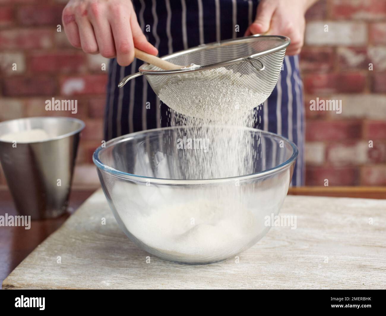 Hands holding sieve sifting flour hi-res stock photography and images - Alamy