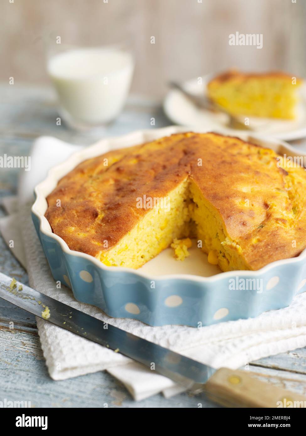 Corn bread in large round baking dish Stock Photo - Alamy
