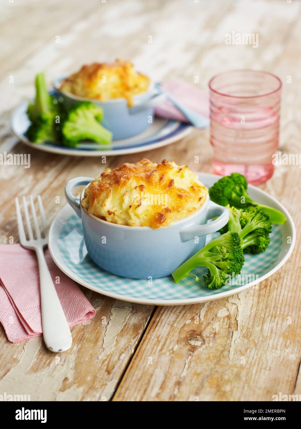 Two individual cottage pies in ramekins Stock Photo - Alamy