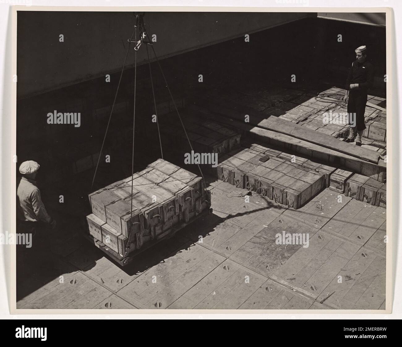This photograph depicts U.S. Coast Guard personnel performing their ...