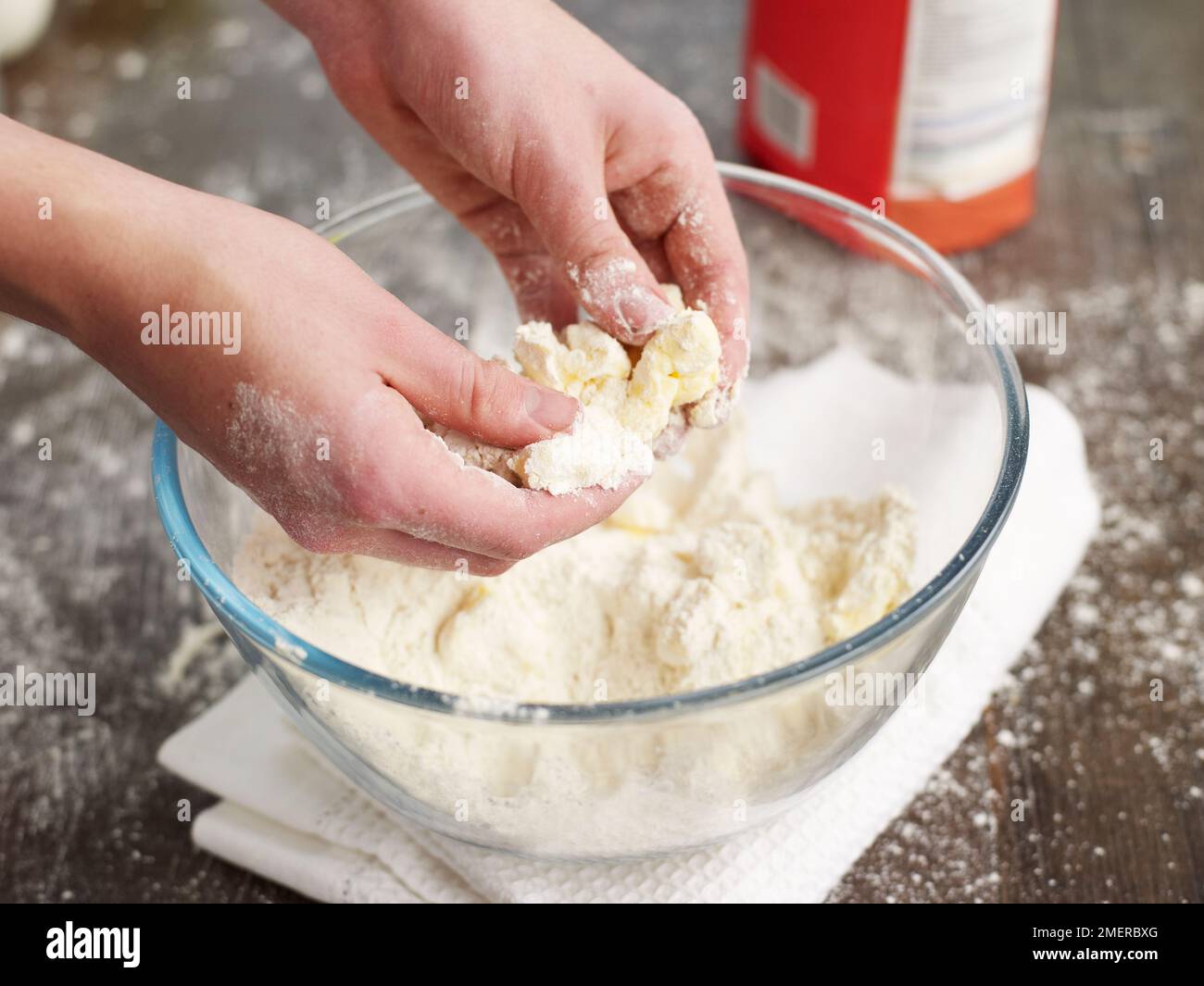 Gingerbread, using fingers to mix flour with butter Stock Photo - Alamy