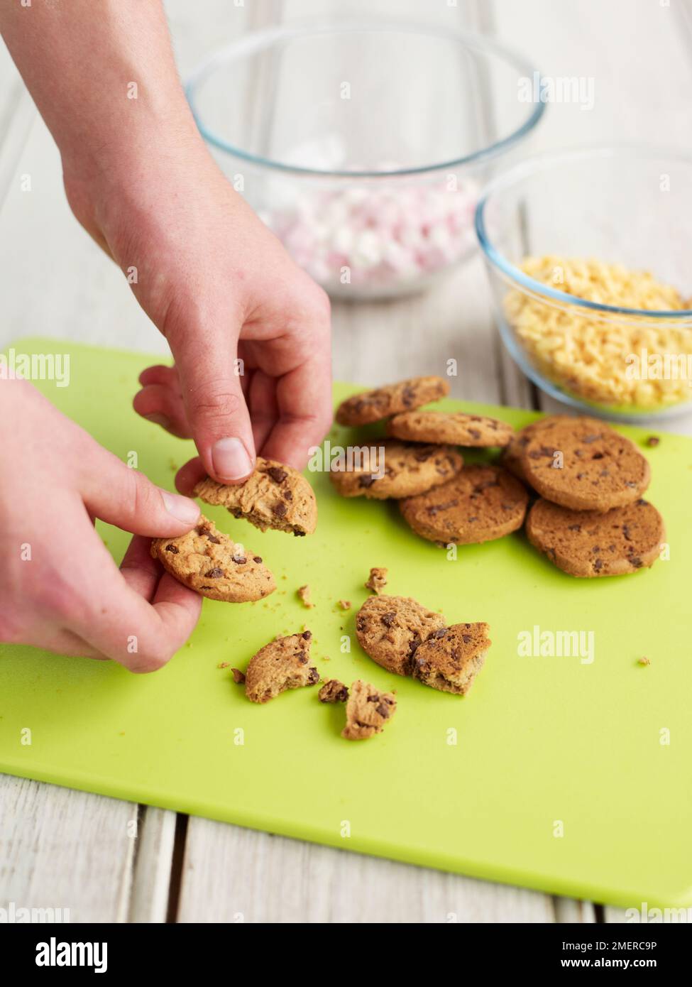 Breaking chocolate chip cookies into small pieces, making frozen ...
