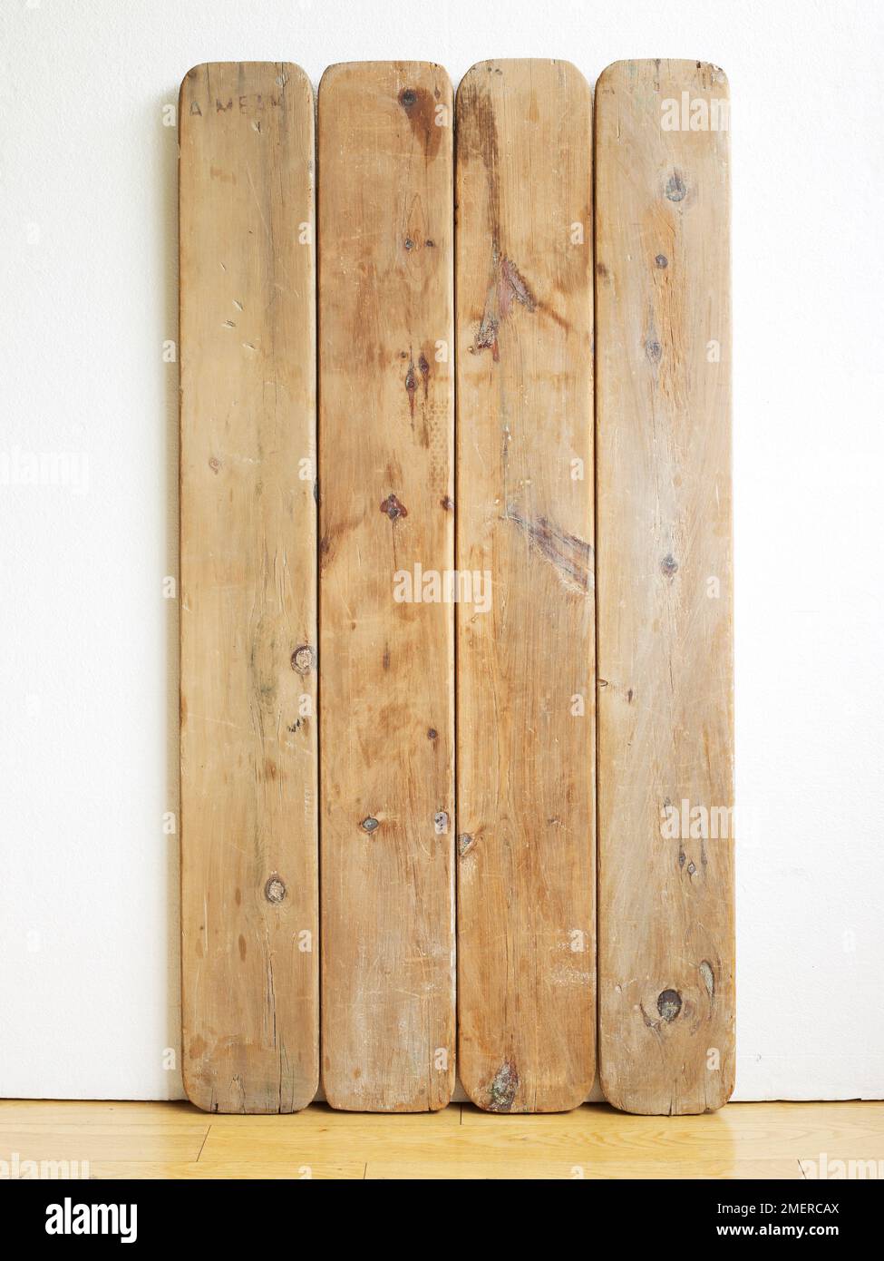 Wooden boards against wall Stock Photo - Alamy
