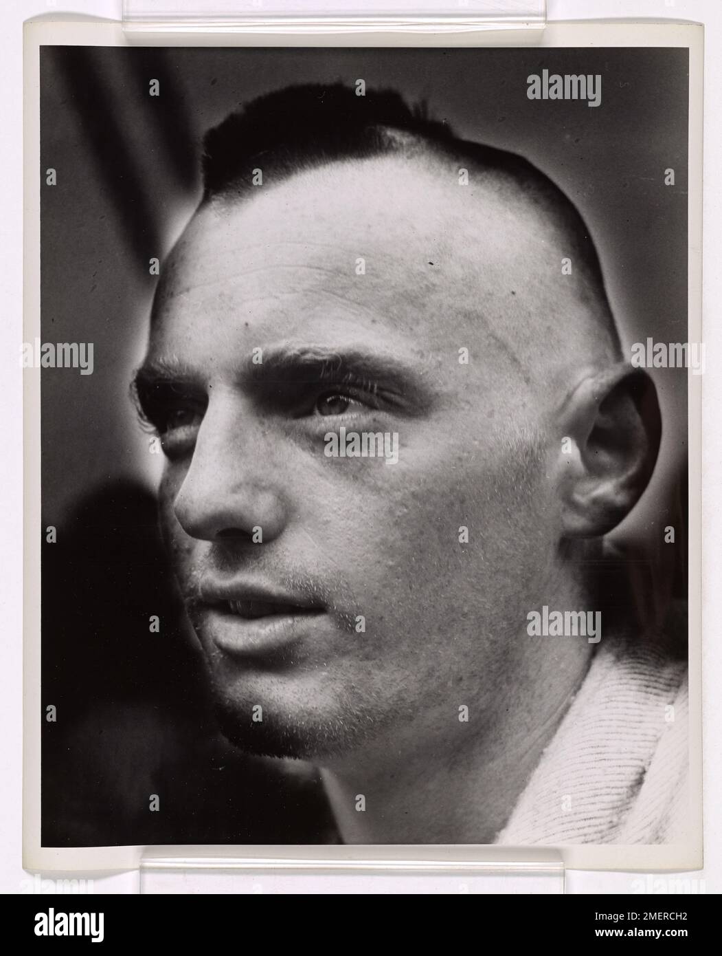 Fuller Brush Man. This image depicts a U.S. Coast Guardsman showing off ...