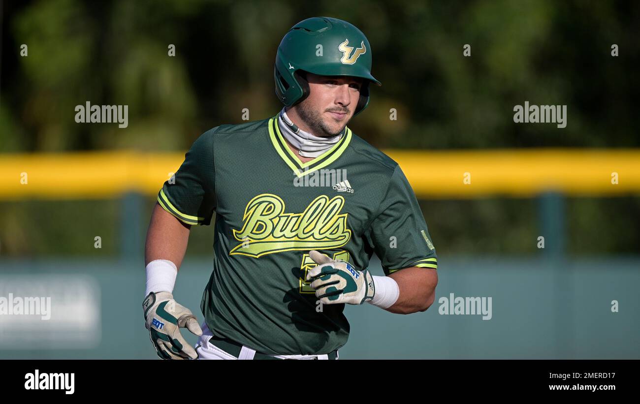 South Florida's Riley Hogan (32) rounds the bases after hitting a solo ...