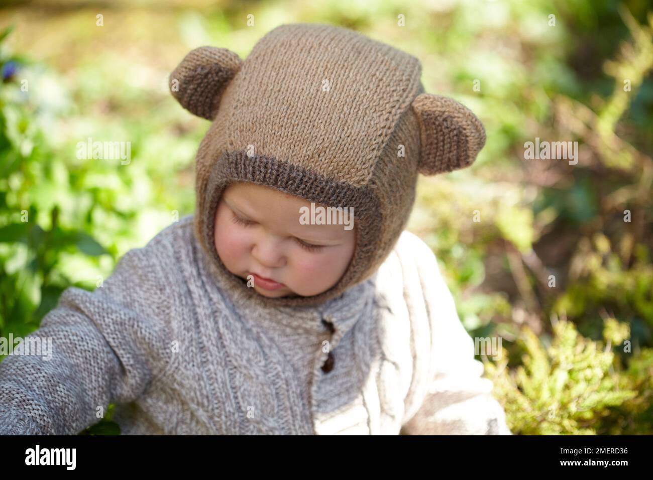 Baby boy wearing a bearaclava, balaclava with ears, 17 months Stock ...