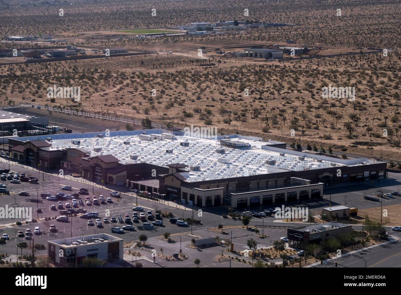 An aerial view of solar panels on the top of Walmart store in Yucca ...