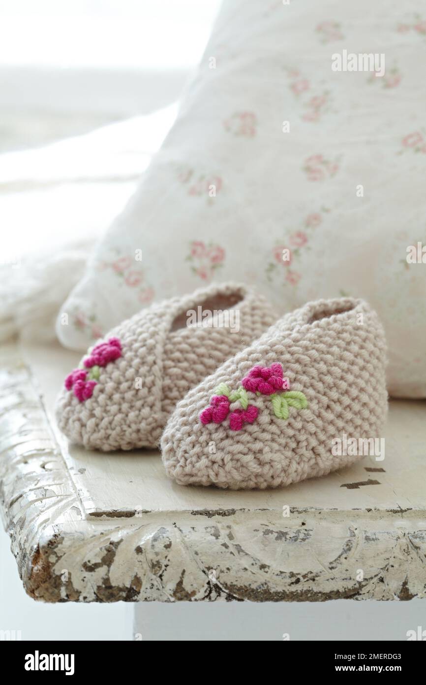 Knitted crossover booties Stock Photo - Alamy