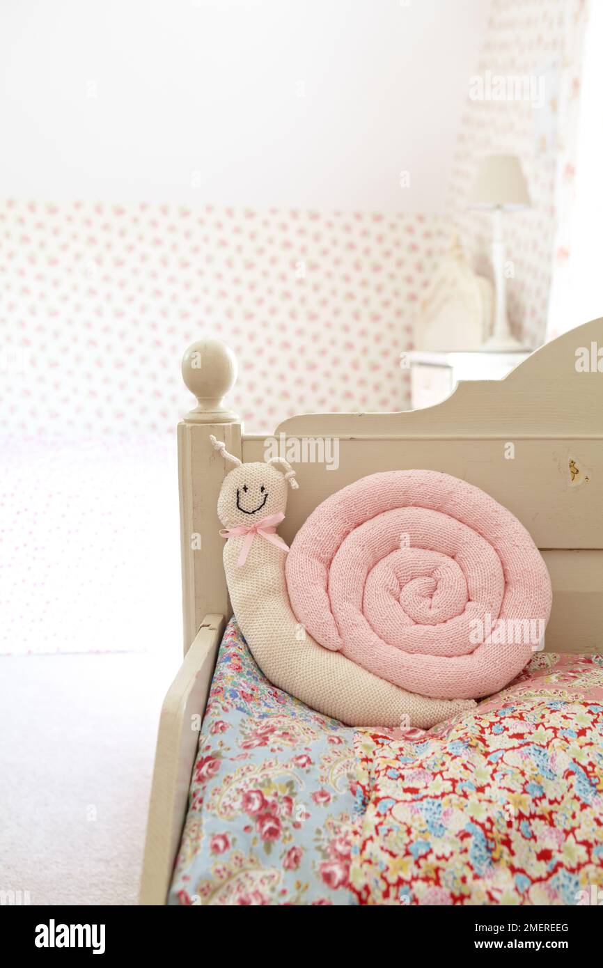 Snail cushion on child's bed Stock Photo - Alamy