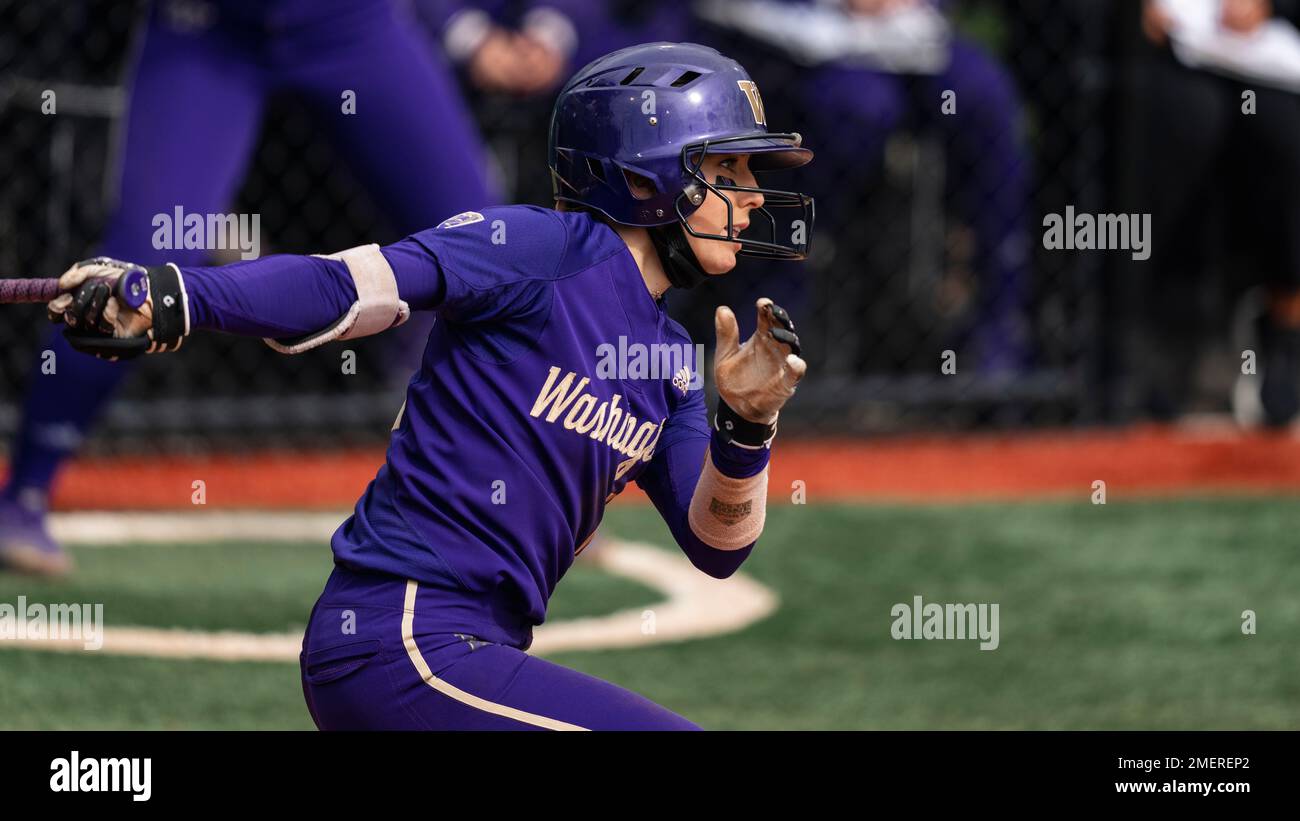 Washington's Sis Bates takes a swing during an at-bat in an NCAA ...