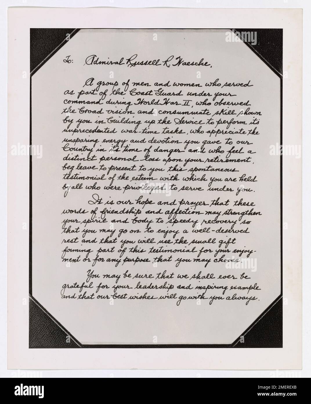 A photograph shows a message from Coast Guard personnel to Admiral ...