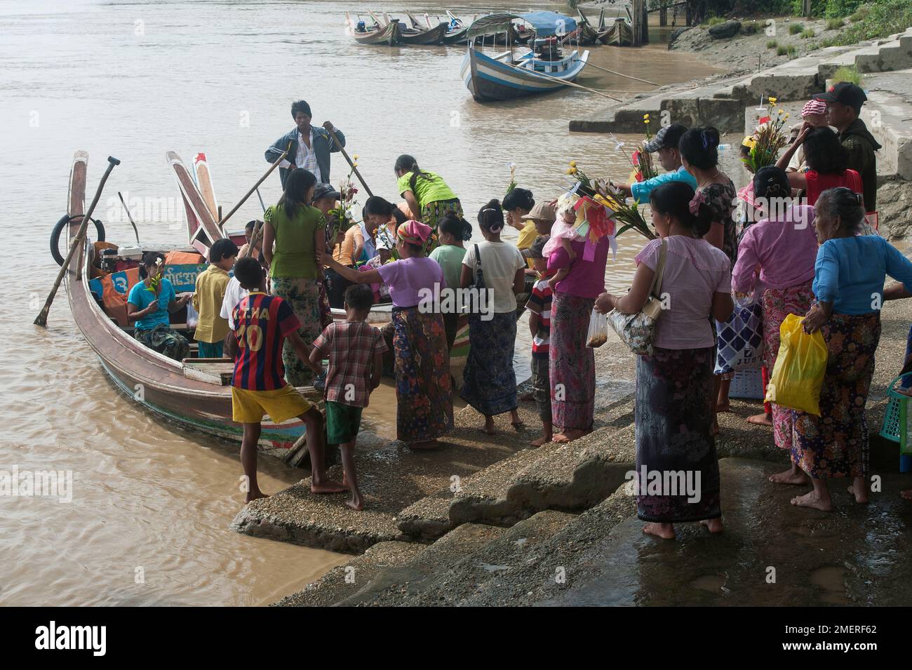 Myanmar, Yangon, Kyauktan, passengers boarding ferry boat to Ye Le Paya ...