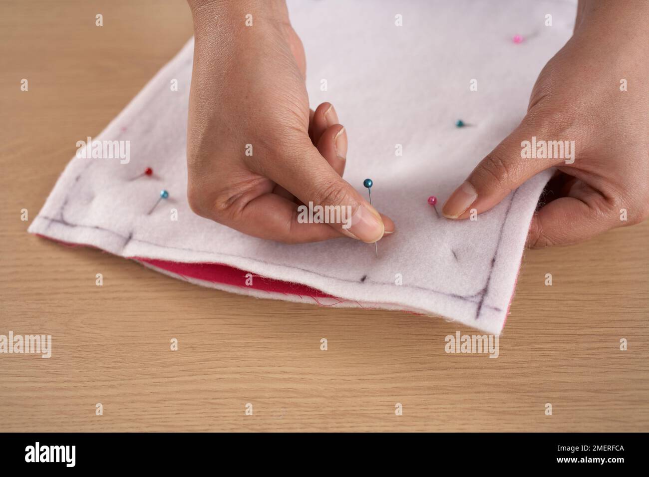 Making a device protector, pin the two padded lining pieces together ...