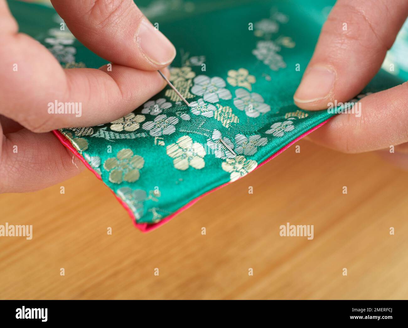 Thai silk manicure roll, turn the fabric right side out. Fold the sides ...