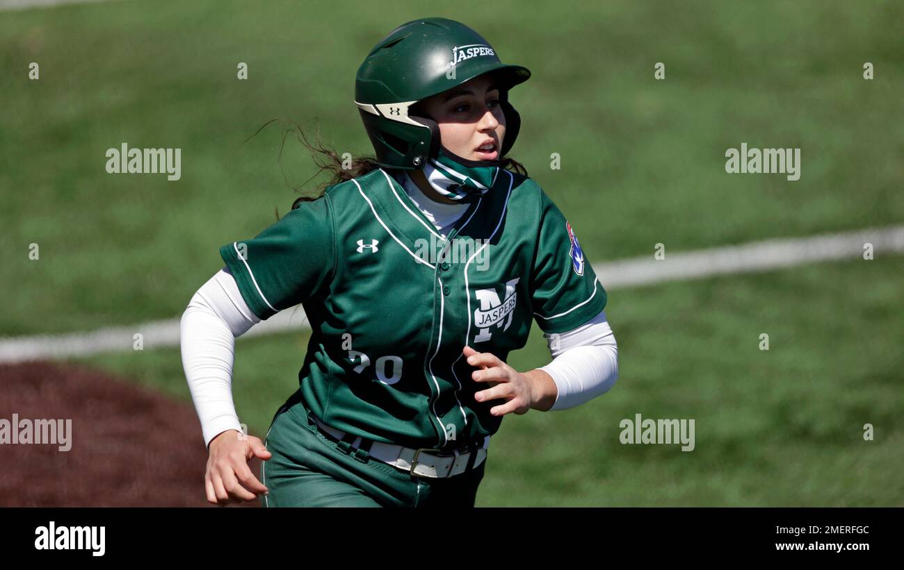 Manhattan College's Victoria Alonso runs up the first baseline against ...