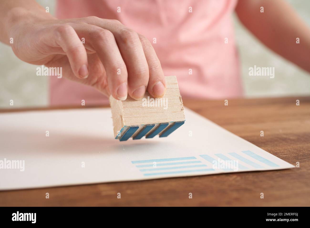 Hand using stamp hi-res stock photography and images - Alamy