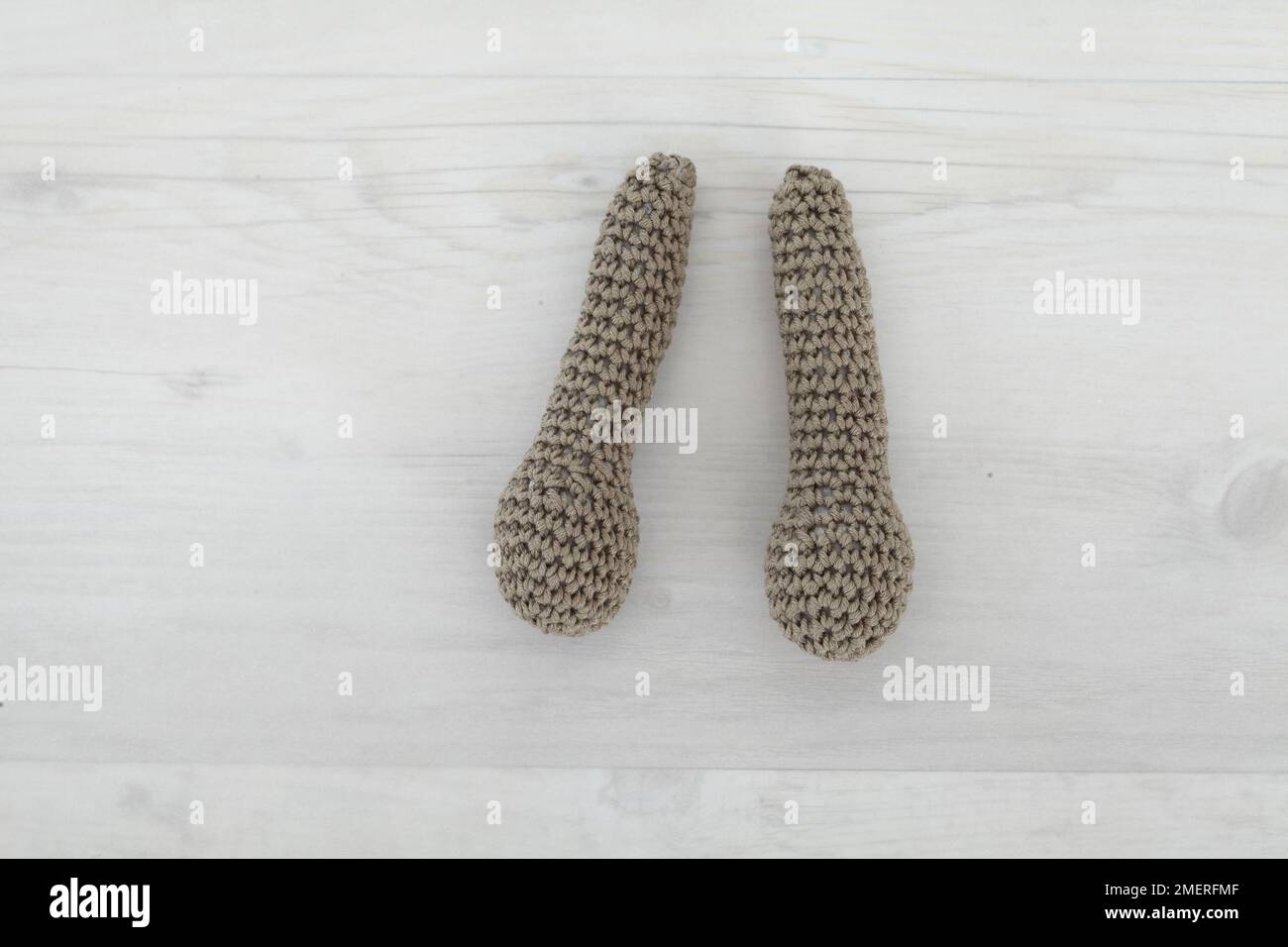 Crocheted bear arms Stock Photo - Alamy