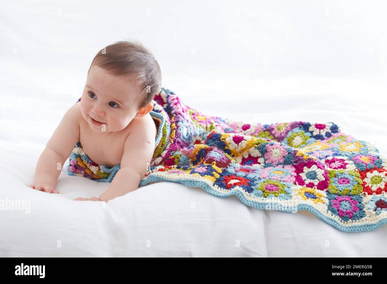 Indian baby under blanket hi-res stock photography and images - Alamy