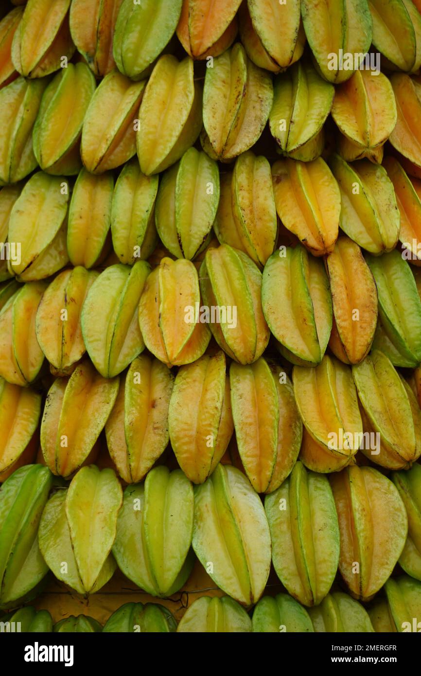 Star fruit (Averrhoa carambola, carambola) with a natural background ...