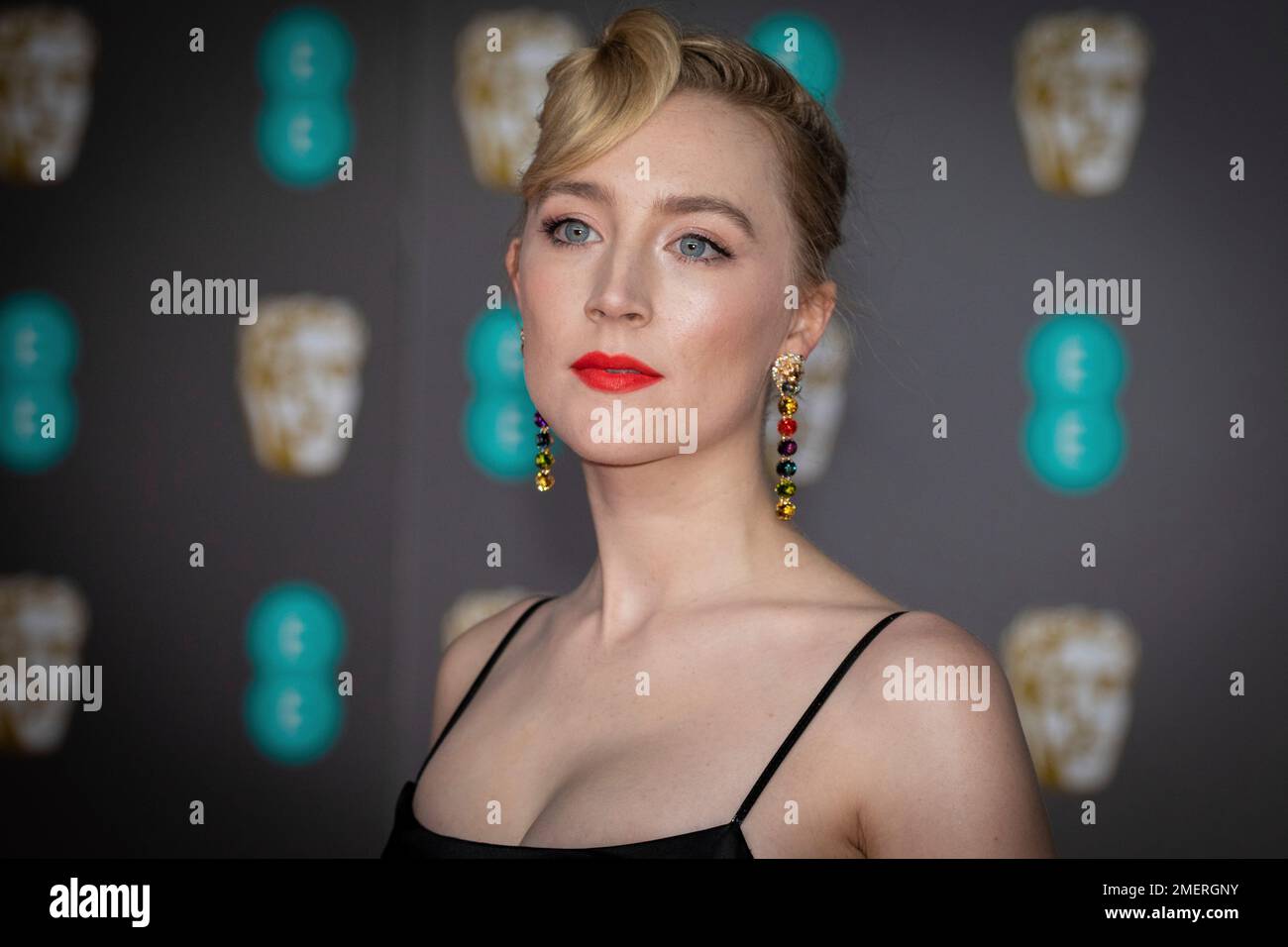 FILE - Saoirse Ronan arrives at the Bafta Film Awards, in central ...
