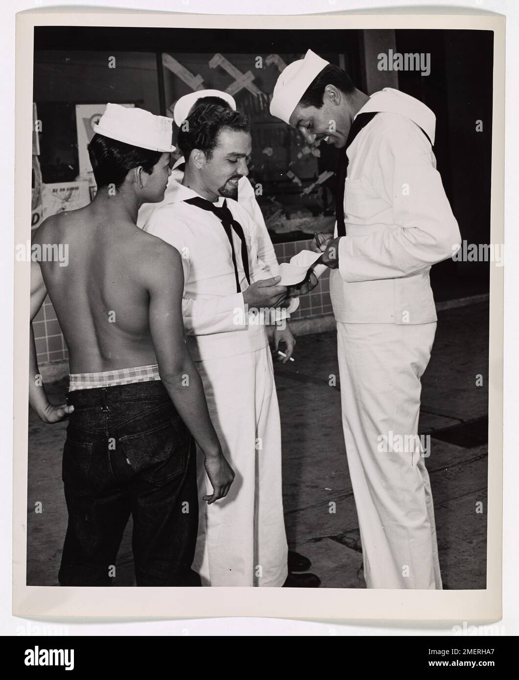Photograph of Cesar Romero Signing Autograph Stock Photo - Alamy