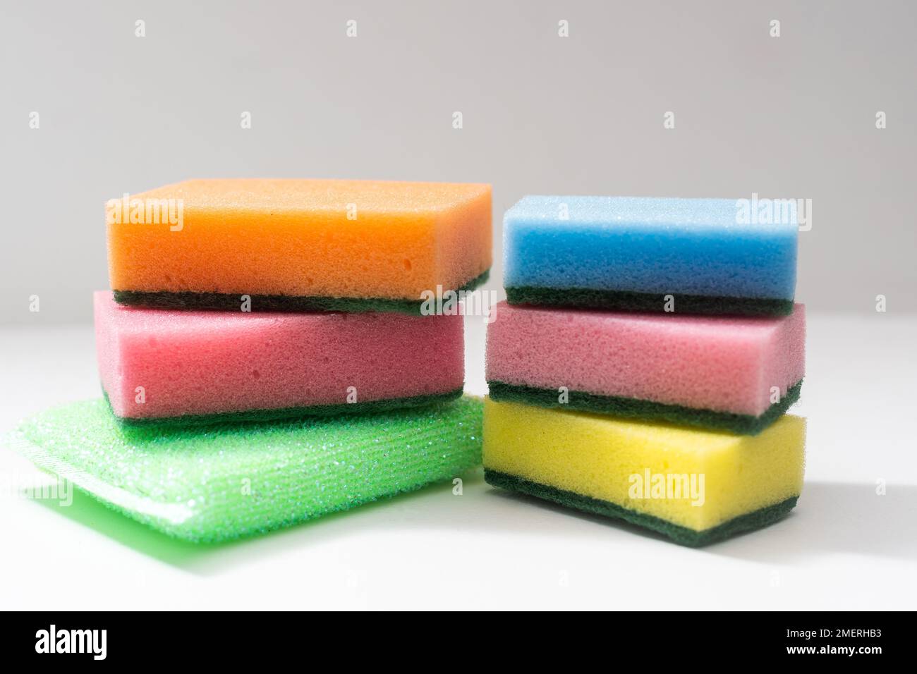 Multi-colored sponges for dishes Isolated on a white background Stock ...