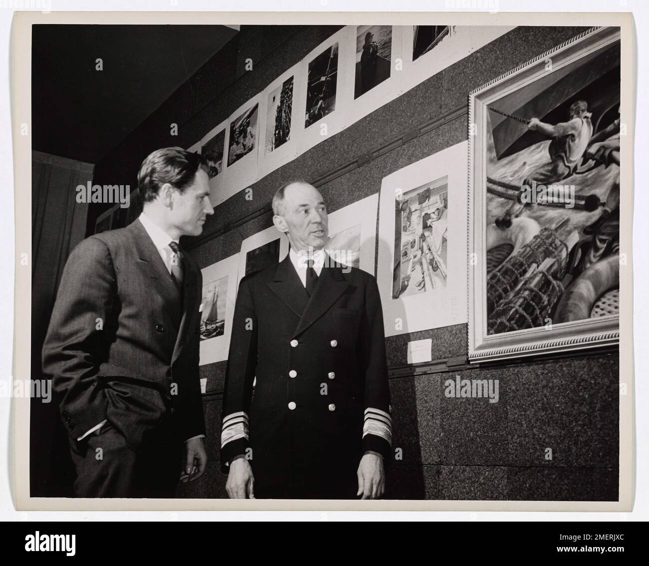 Nelson A. Rockefeller and Vice Admiral Russell R. Waesche view an ...