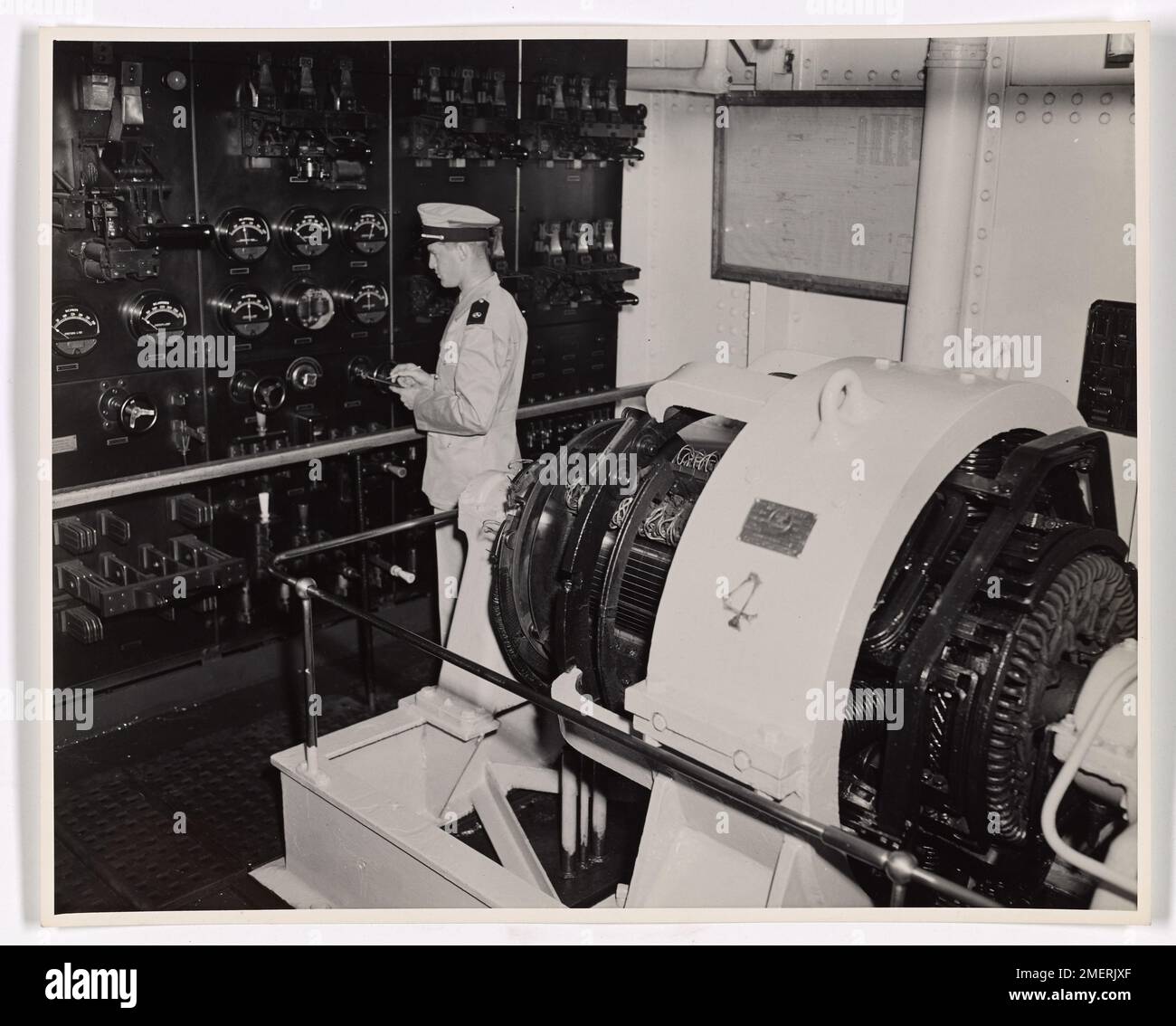 U.S. Maritime "Engineer Cadet" in Engine Room of Large Liner Checking ...