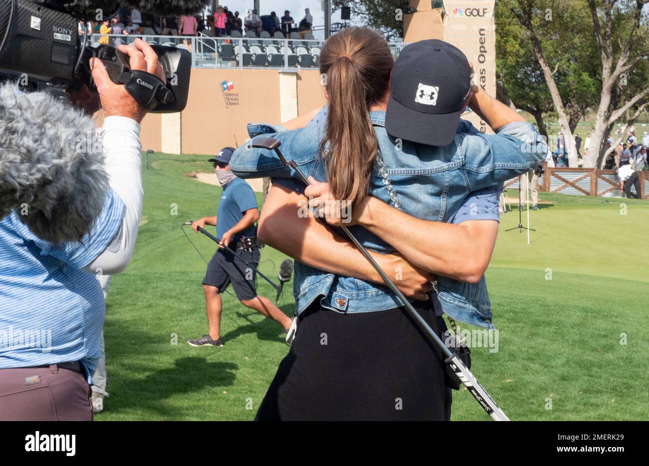 Jordan Spieth gives his wife, Annie Verret, a hug after winning the ...