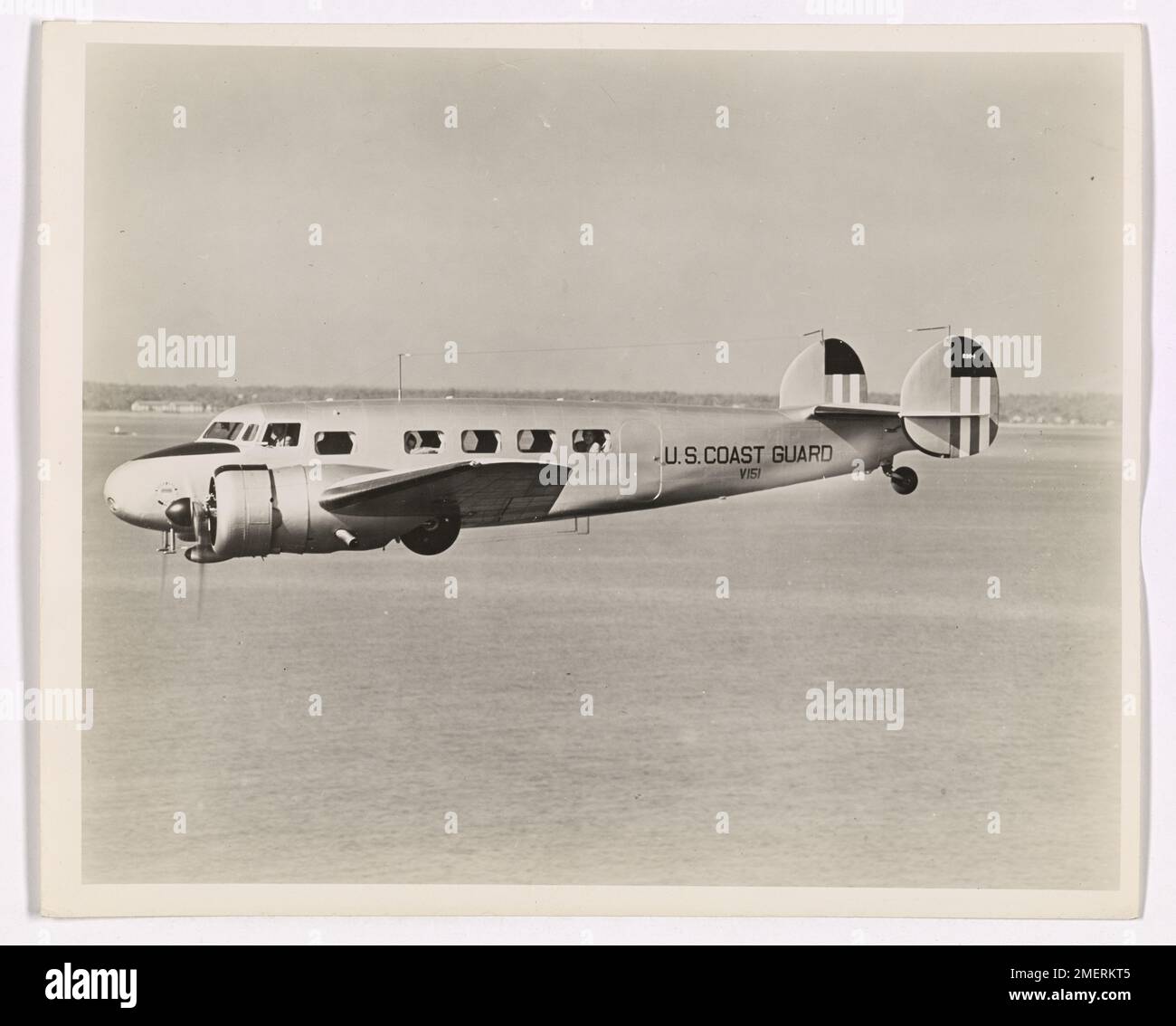 A Lockheed Aircraft Company transport plane, V-151, is depicted in ...