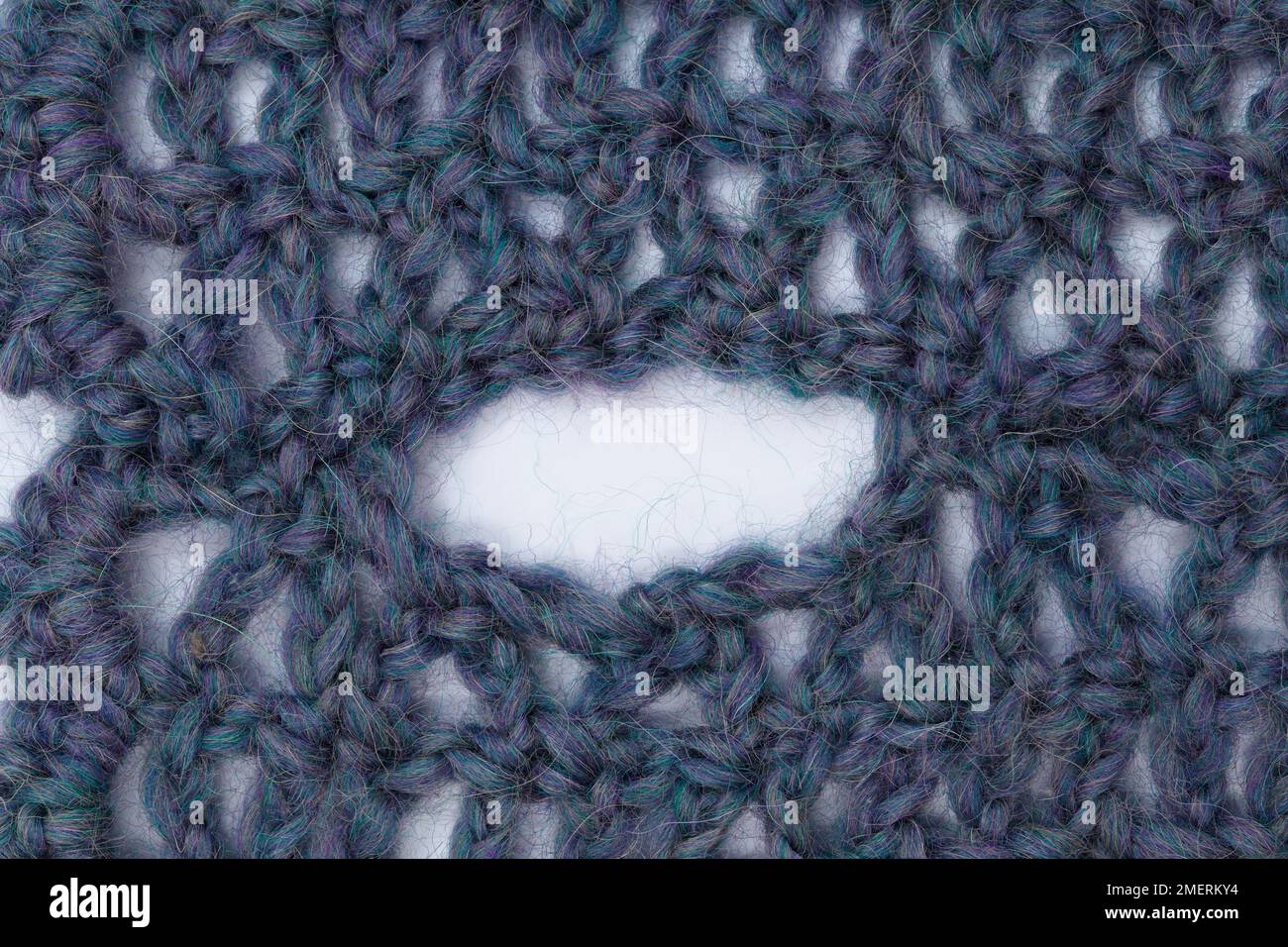 Crocheted wrist warmer, thumbhole Stock Photo - Alamy