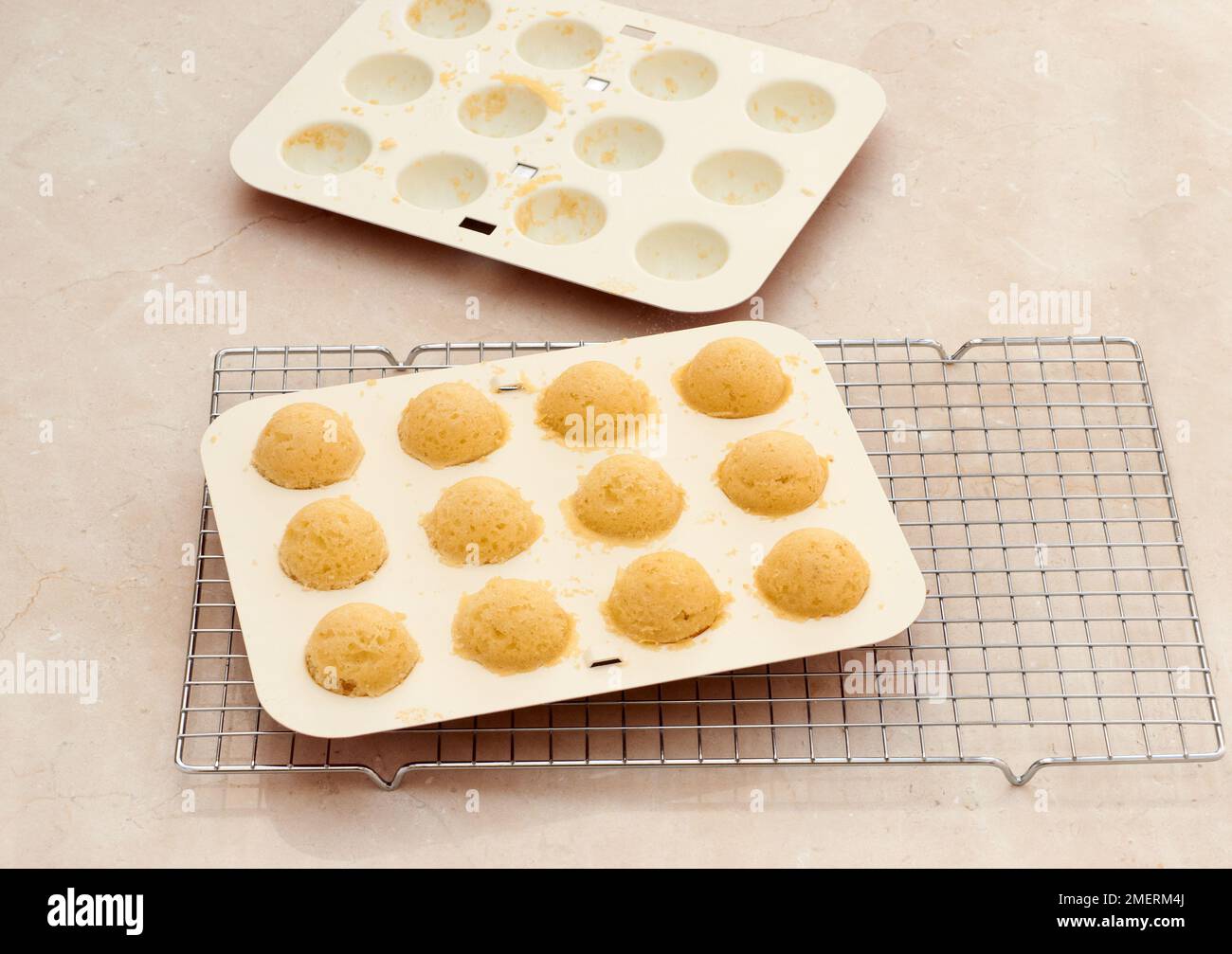 Sponge cake in cake pop tray Stock Photo - Alamy