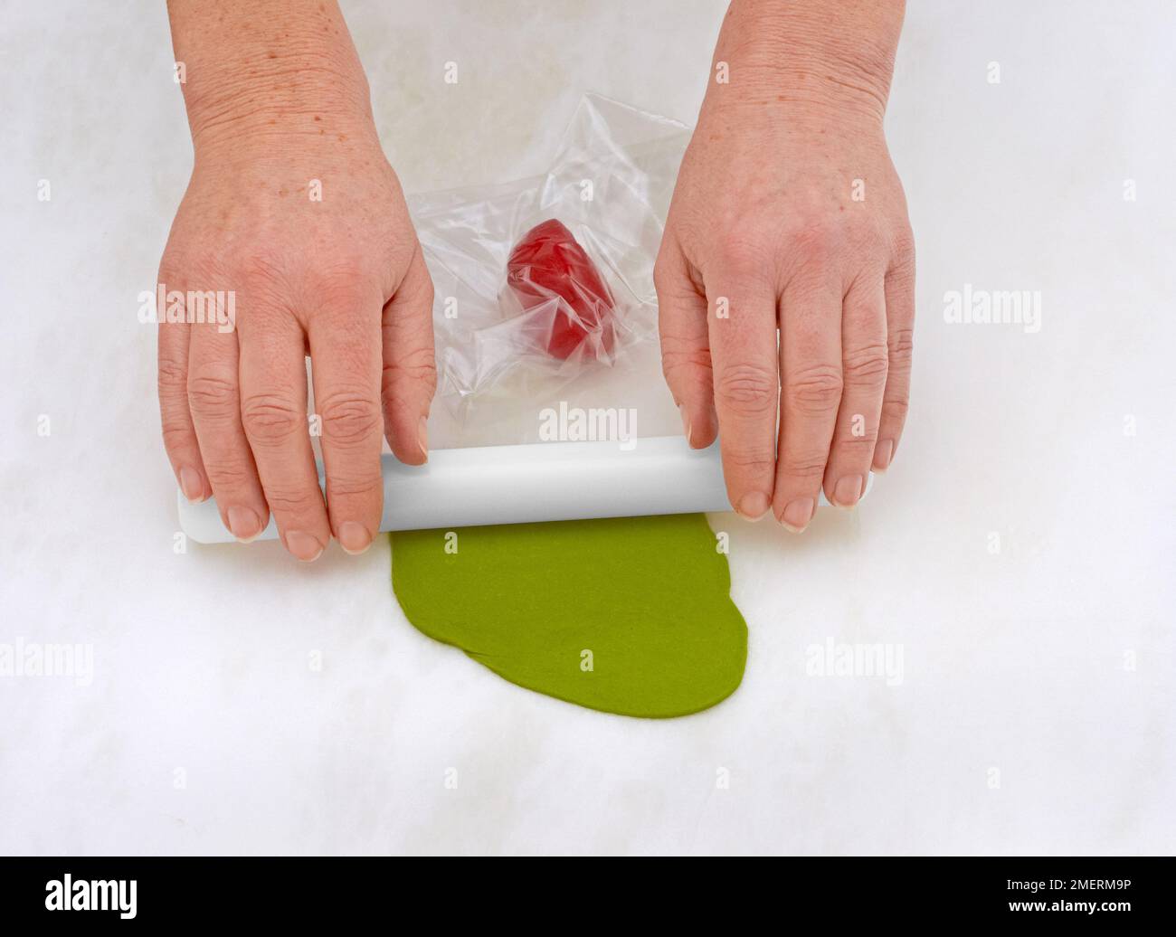 Rolling royal icing Stock Photo - Alamy