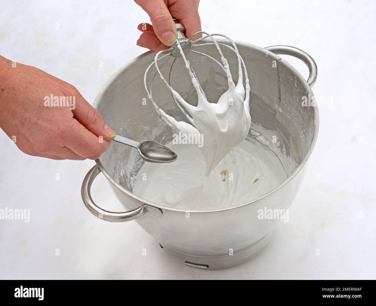 Mixing royal icing Stock Photo - Alamy