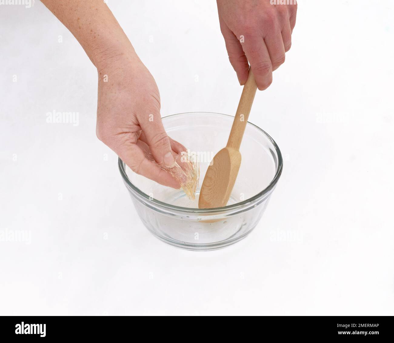 Mixing fondant icing Stock Photo - Alamy
